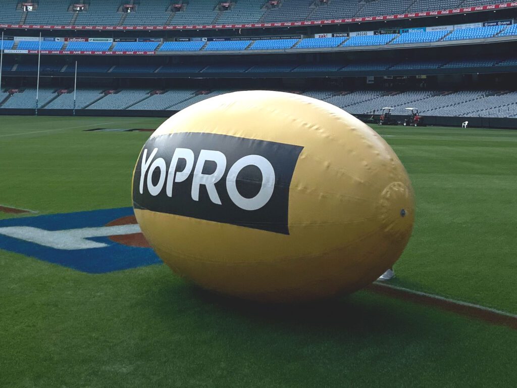 Giant Inflatable AFL Balls' unique halftime spectacle.